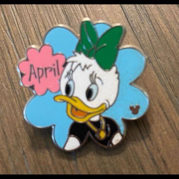 Disney | Jewelry | Disney April Duck Flower 205 Pin Cast Lanyard | Poshmark